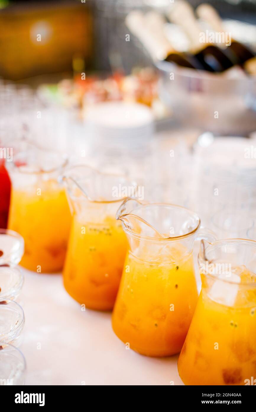 Different types of summer drinks in glasses, cubes of ice and slice of ...