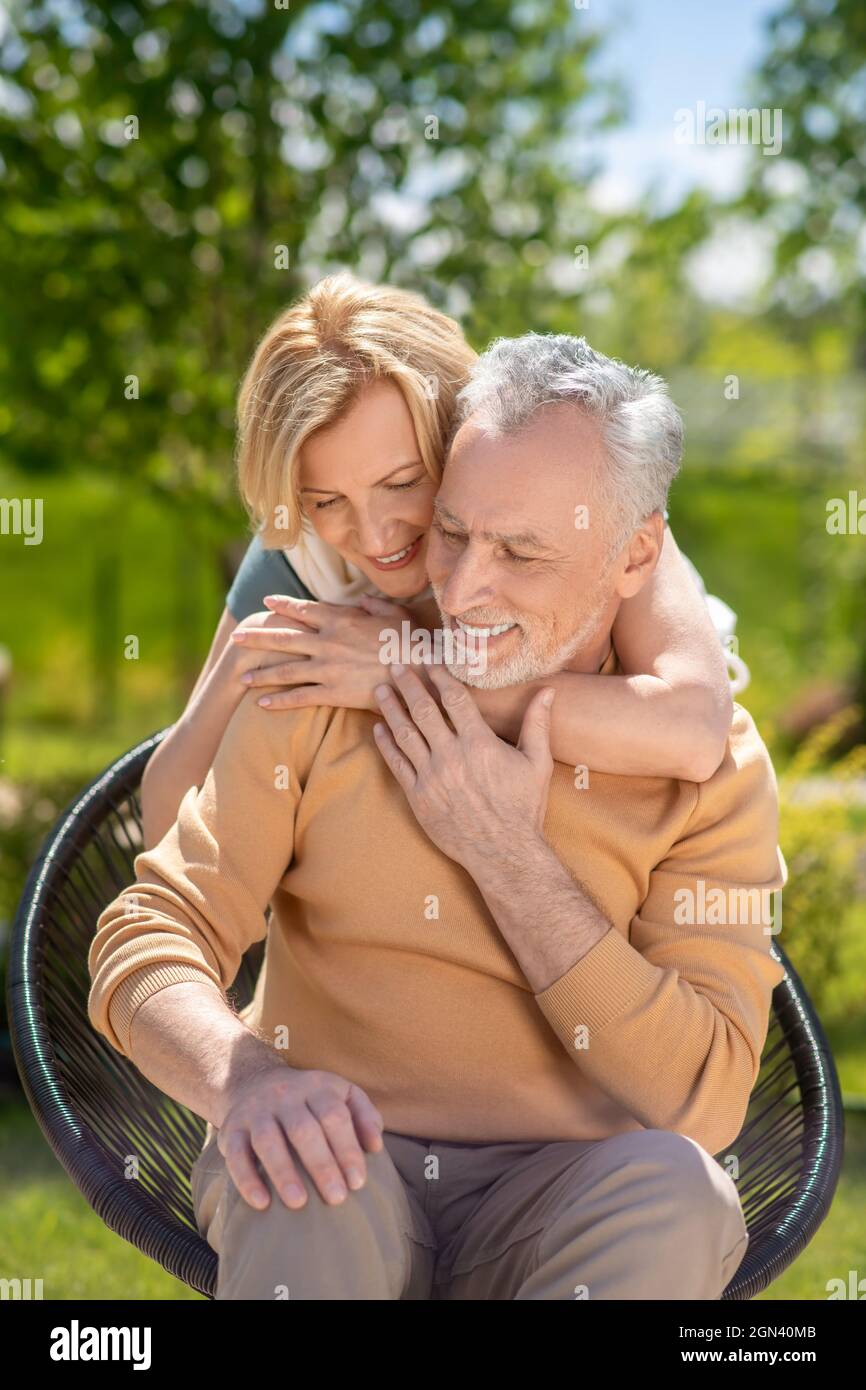 Husband hugs hi-res stock photography and images - Alamy