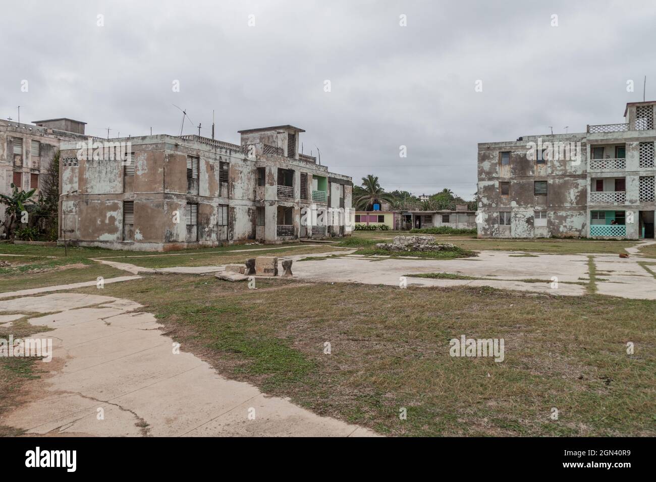 Dilipitated concrete blocks of flats in Gibara village, Cuba Stock ...