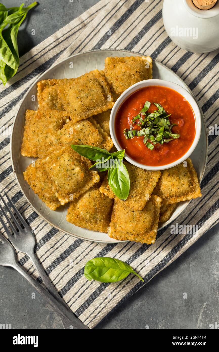 Homemade Fried Raviolis with Basil and Marinara Sauce Stock Photo - Alamy