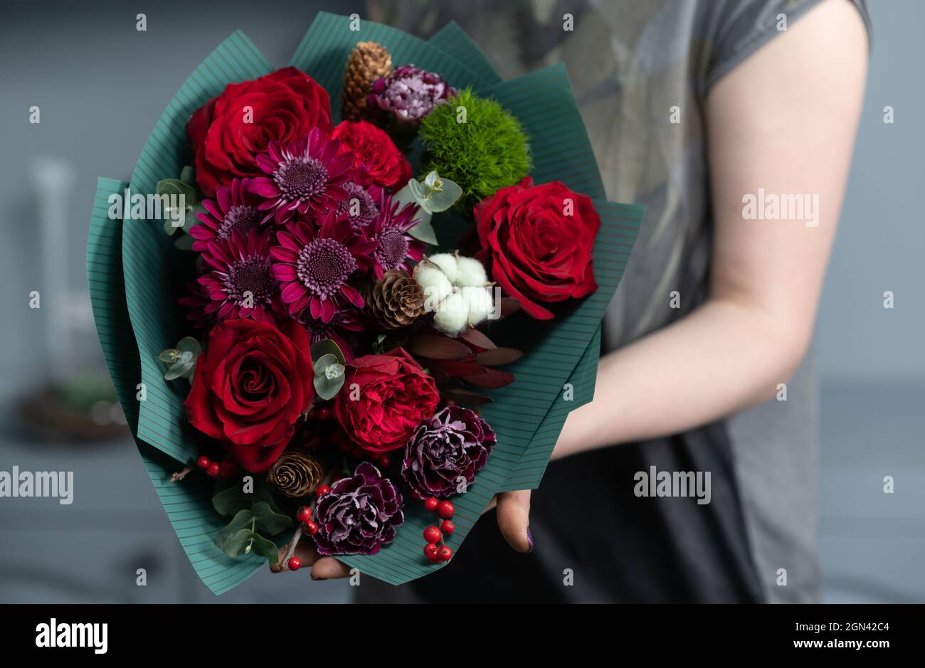 Large beautiful bouquet of mixed flowers in woman hand. Floral shop ...