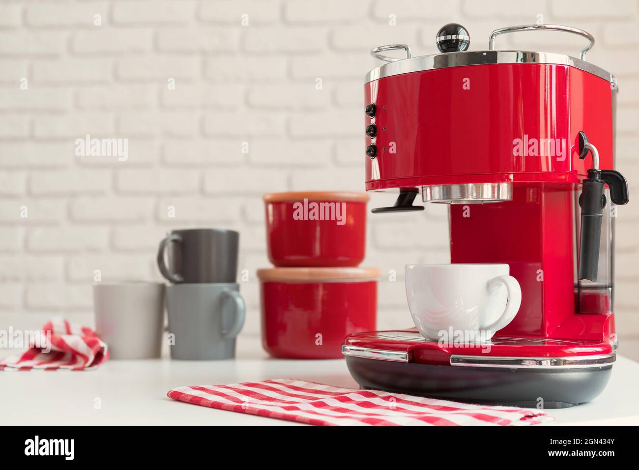 Modern kitchen. Red retro style coffee machine close up Stock Photo - Alamy