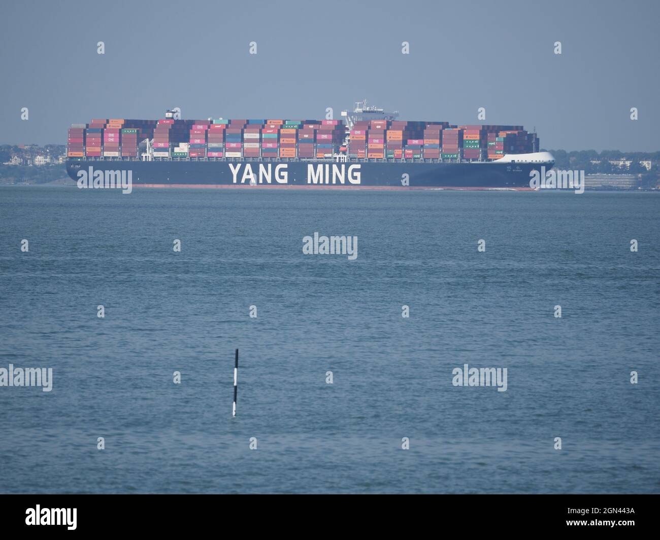 Sheerness, Kent, UK. 22nd September, 2021. Heavily loaded container ship 'YM Wisdom' seen ...