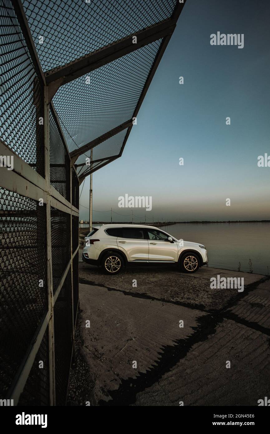 White compact SUV car with sport and modern design parked on concrete ...