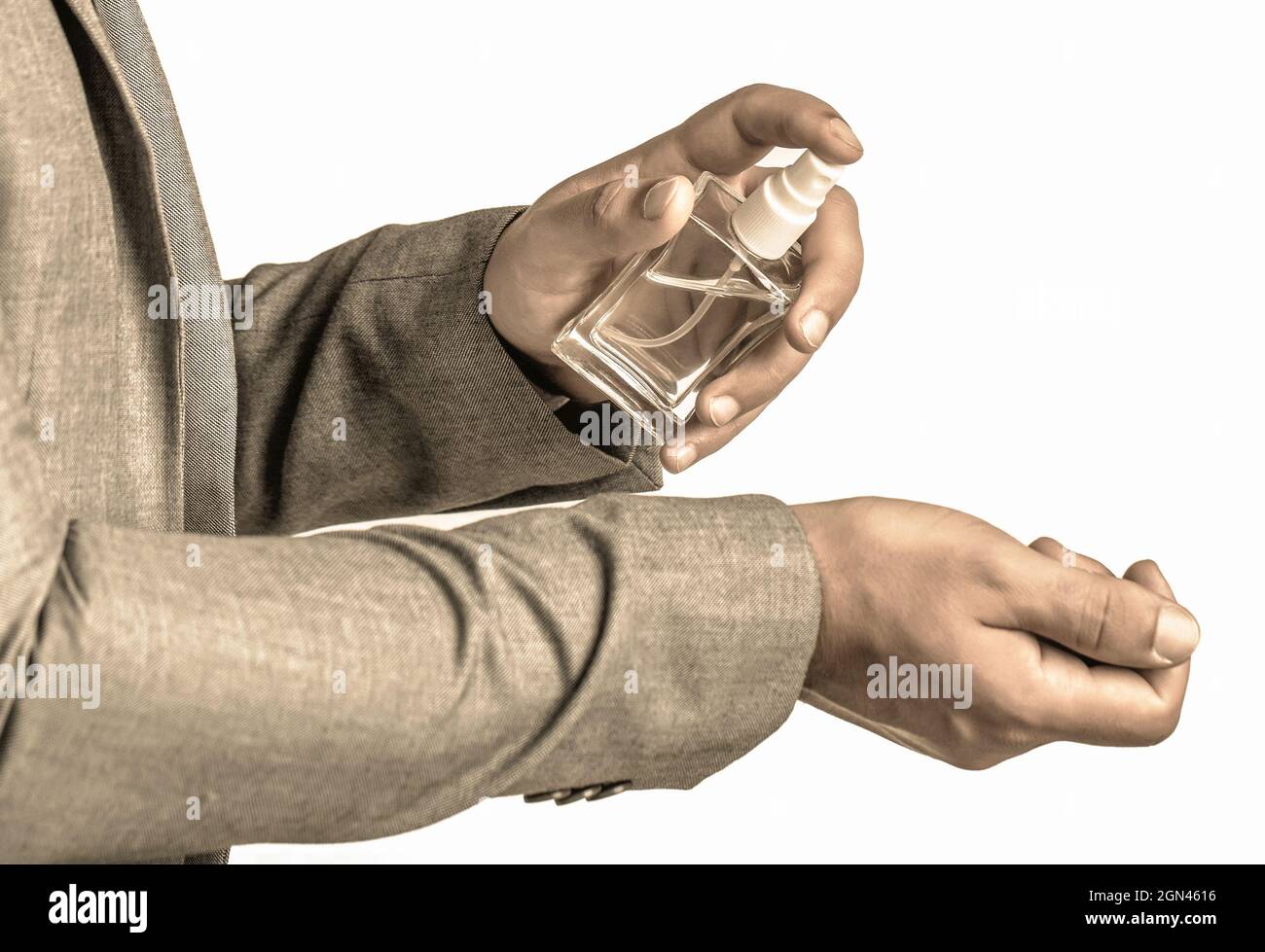 Handsome man in formal suit and with bottle of perfume, closeup. Man ...