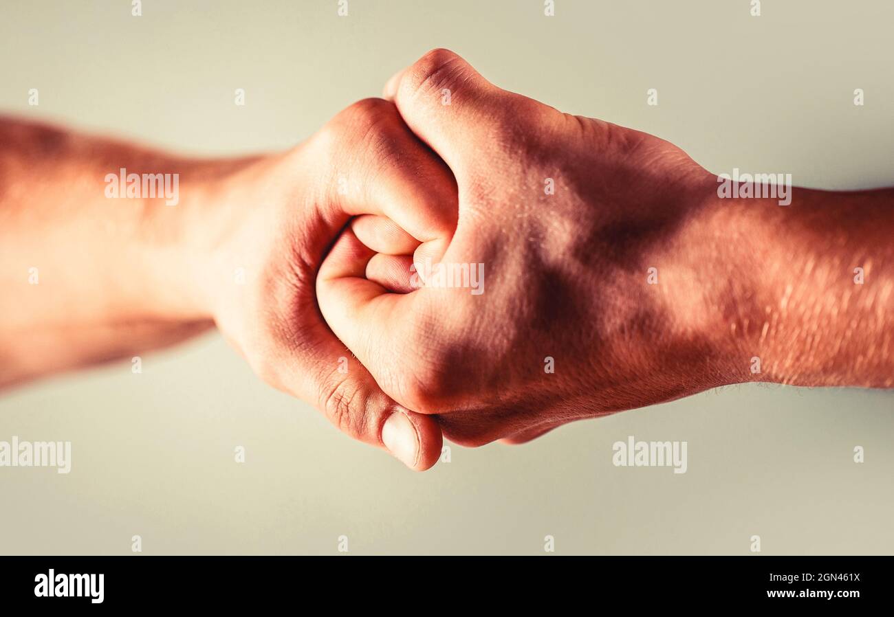 Friendly handshake, friends greeting. Rescue, helping hand. Male hand ...