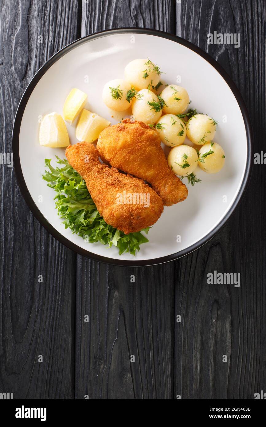 Wiener Backhendl Viennese fried chicken prepared and spiced portions of ...