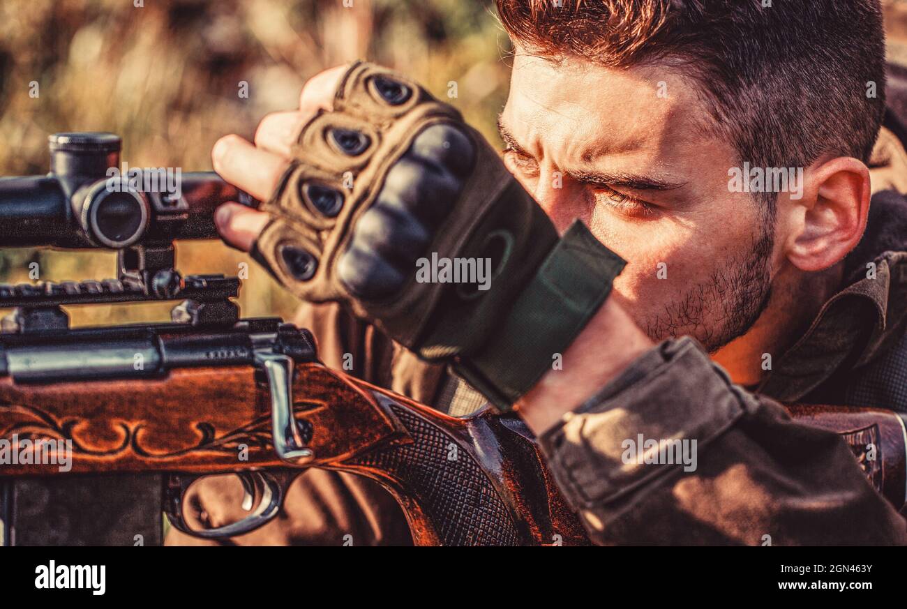 Hunting period. Male with a gun. Close up. Hunter with hunting gun and ...