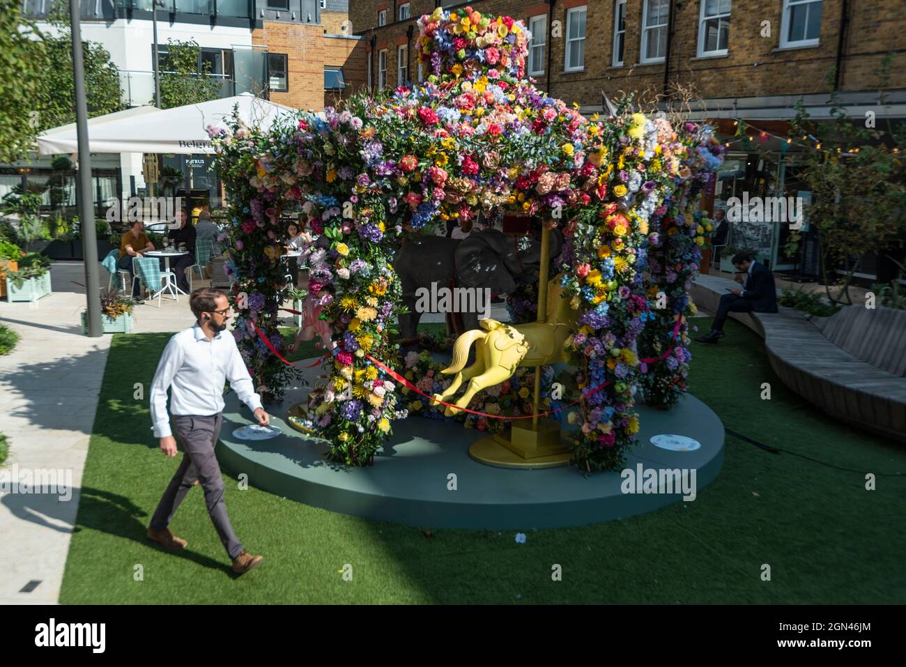 London, UK. 22 September 2021. A flower installation in Halkin Arcade ...