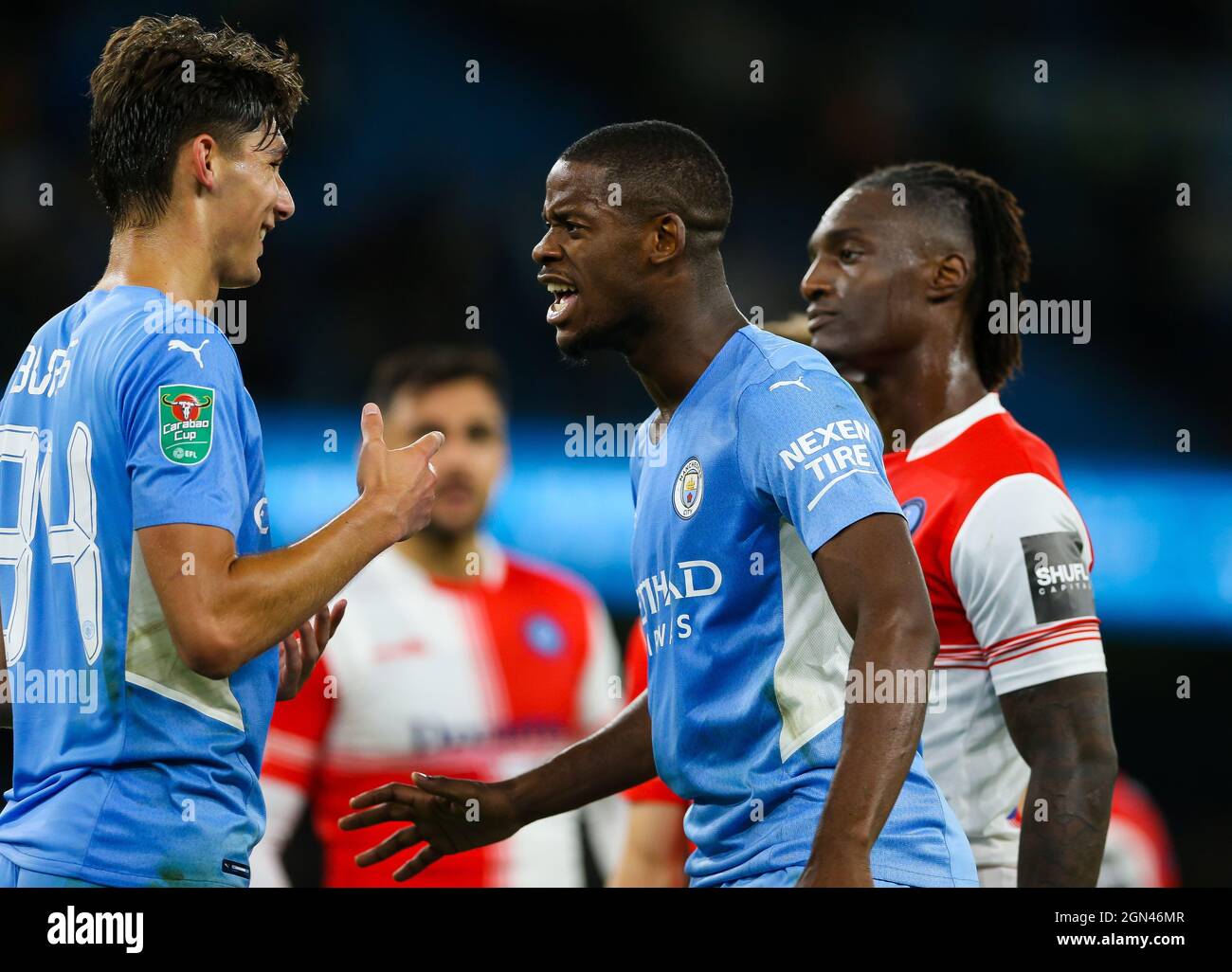 Manchester City's Finley Burns and Luke Mbete during the Carabao Cup ...