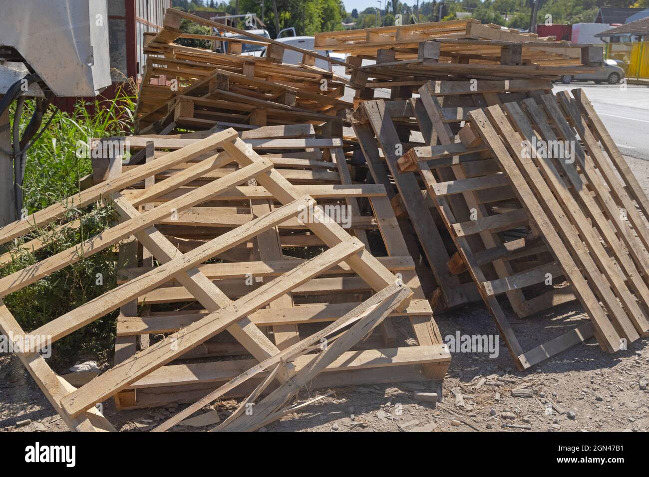 Big Pile of Used Wooden Cargo Pallets Stock Photo - Alamy