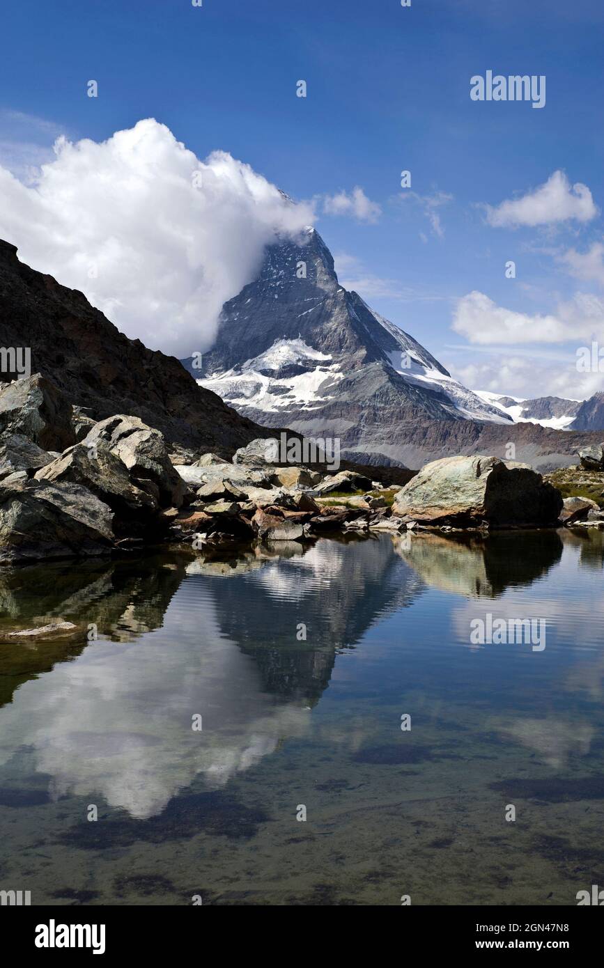 Matterhorn reflection in Riffelsee Stock Photo - Alamy
