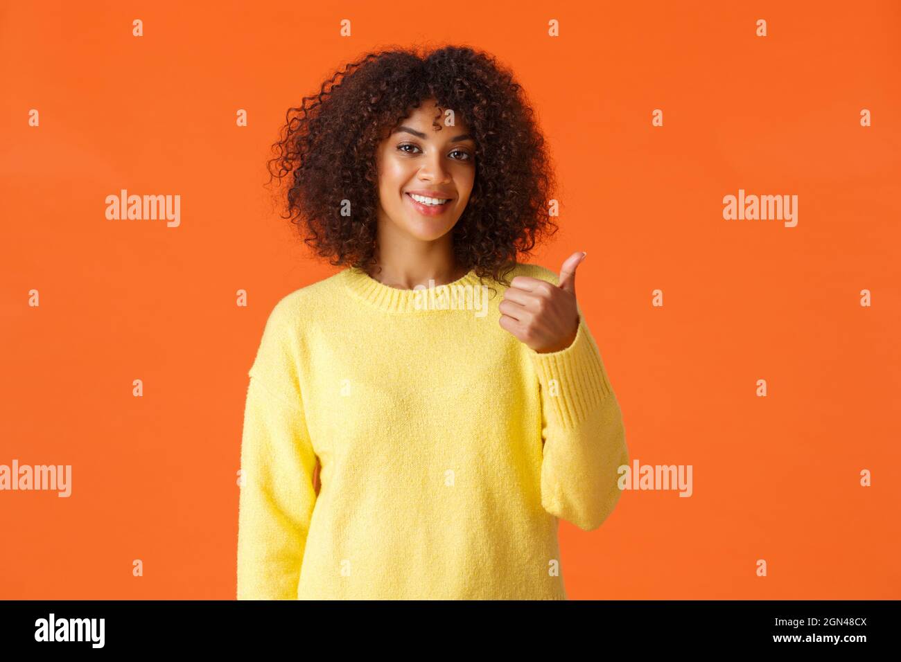 Pointing behind with her thumb hi-res stock photography and images - Alamy