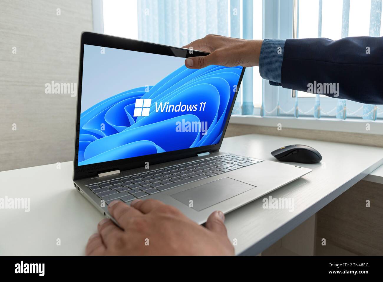 June 23, 2021. Barnaul, Russia. Windows 11 logo on laptop screen. A new ...
