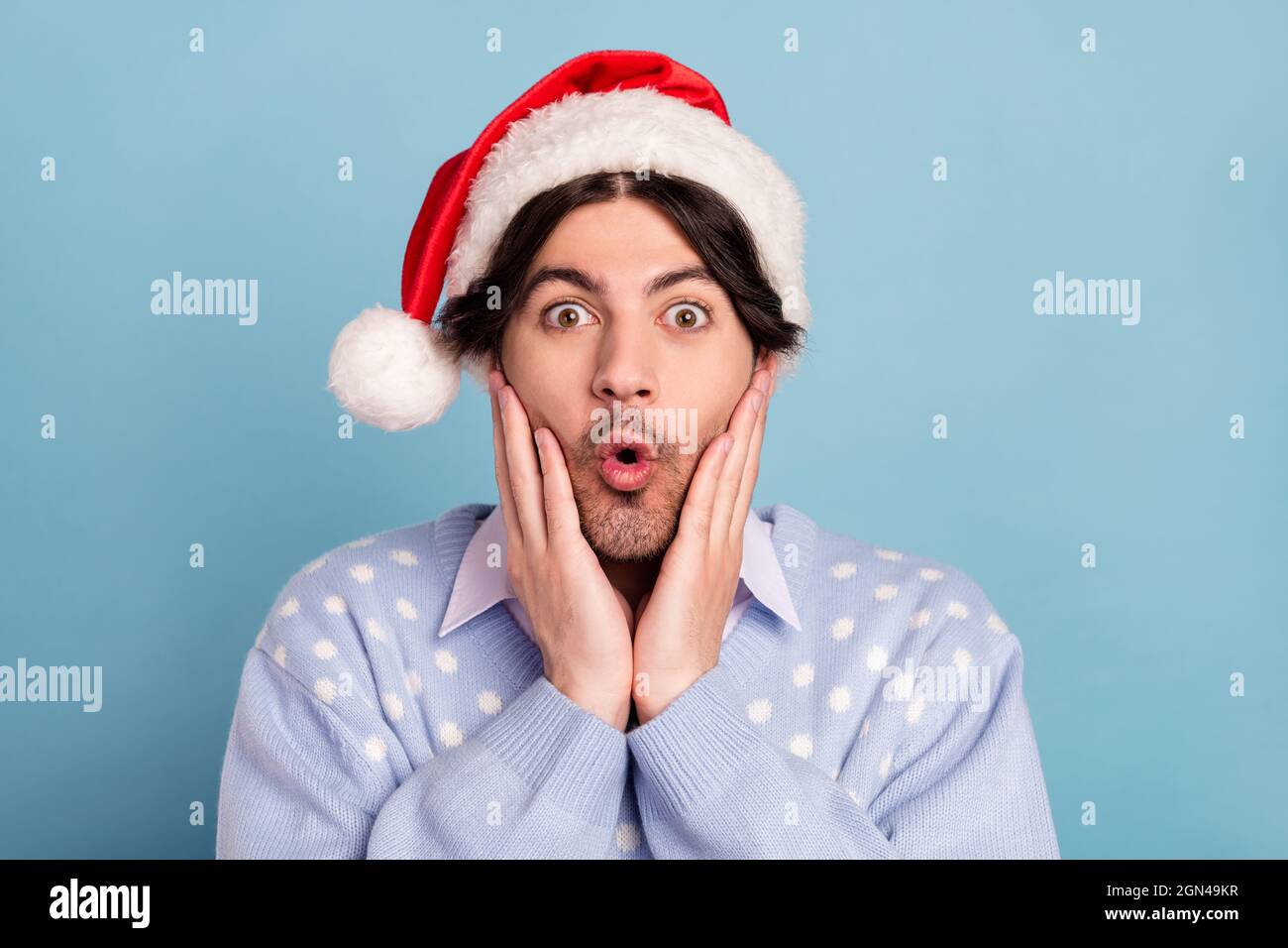 Photo Of Amazed Shocked Surprised Young Man Hold Hands Cheekbones