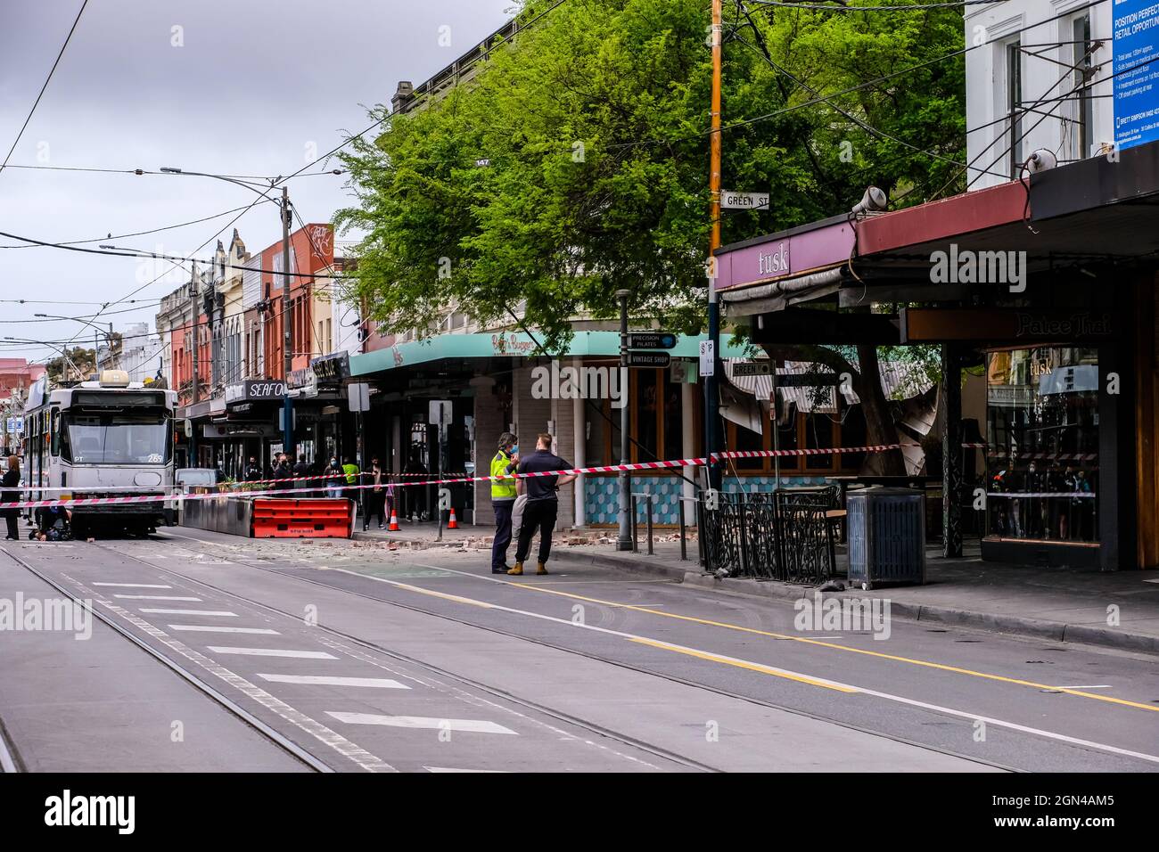 Melbourne, Australia. 22nd Sep, 2021. People are seen examining damage ...