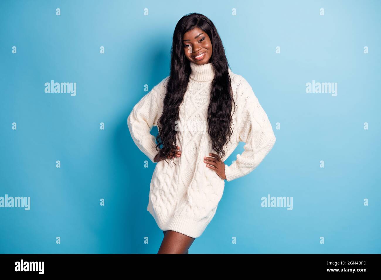 Photo of gorgeous positive dark skin girl put hands on waist toothy ...