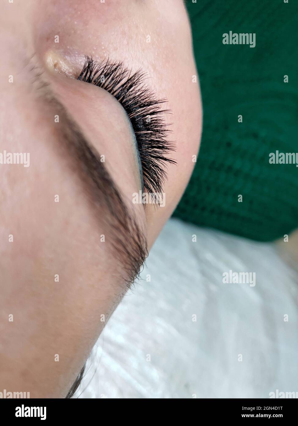 Lash extensions in beauty salon macro eye top view Stock Photo - Alamy