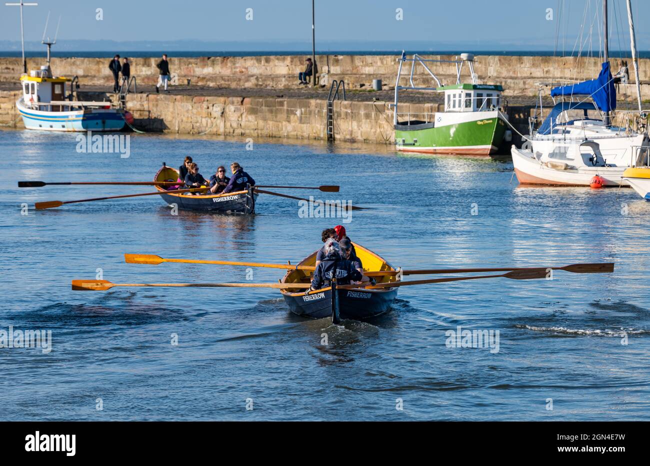 Eskmuthe coastal rowing club rowing boat skiffs leaving Fisherrrow ...
