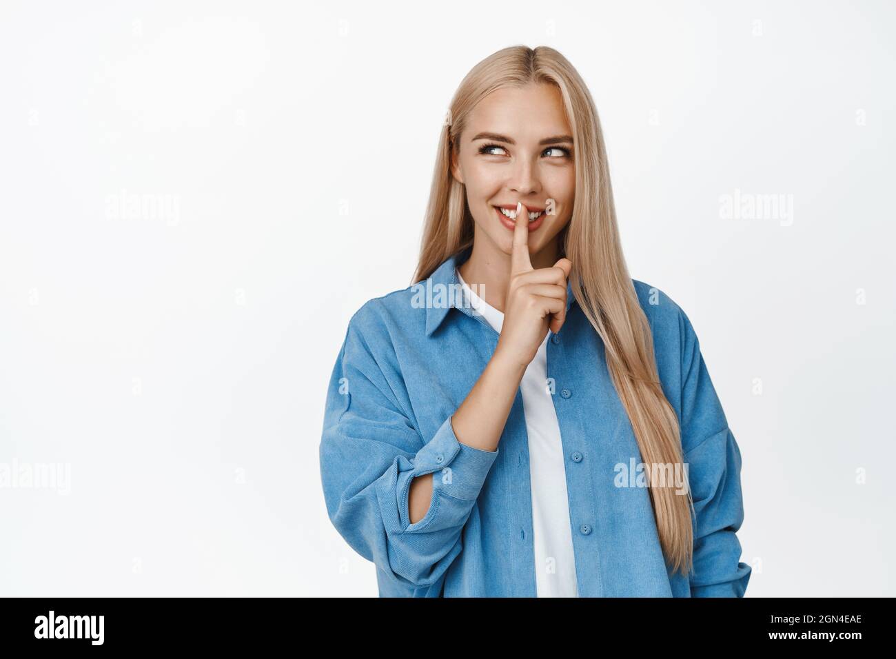 Pretty woman hushing beauty portrait hi-res stock photography and ...