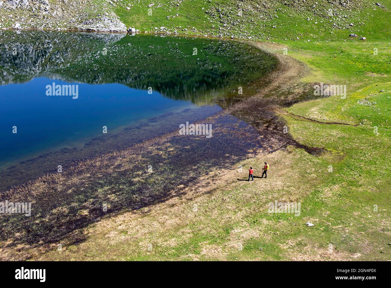 Mother and son on a trekking trip to manito lake above lake kapetanovo ...