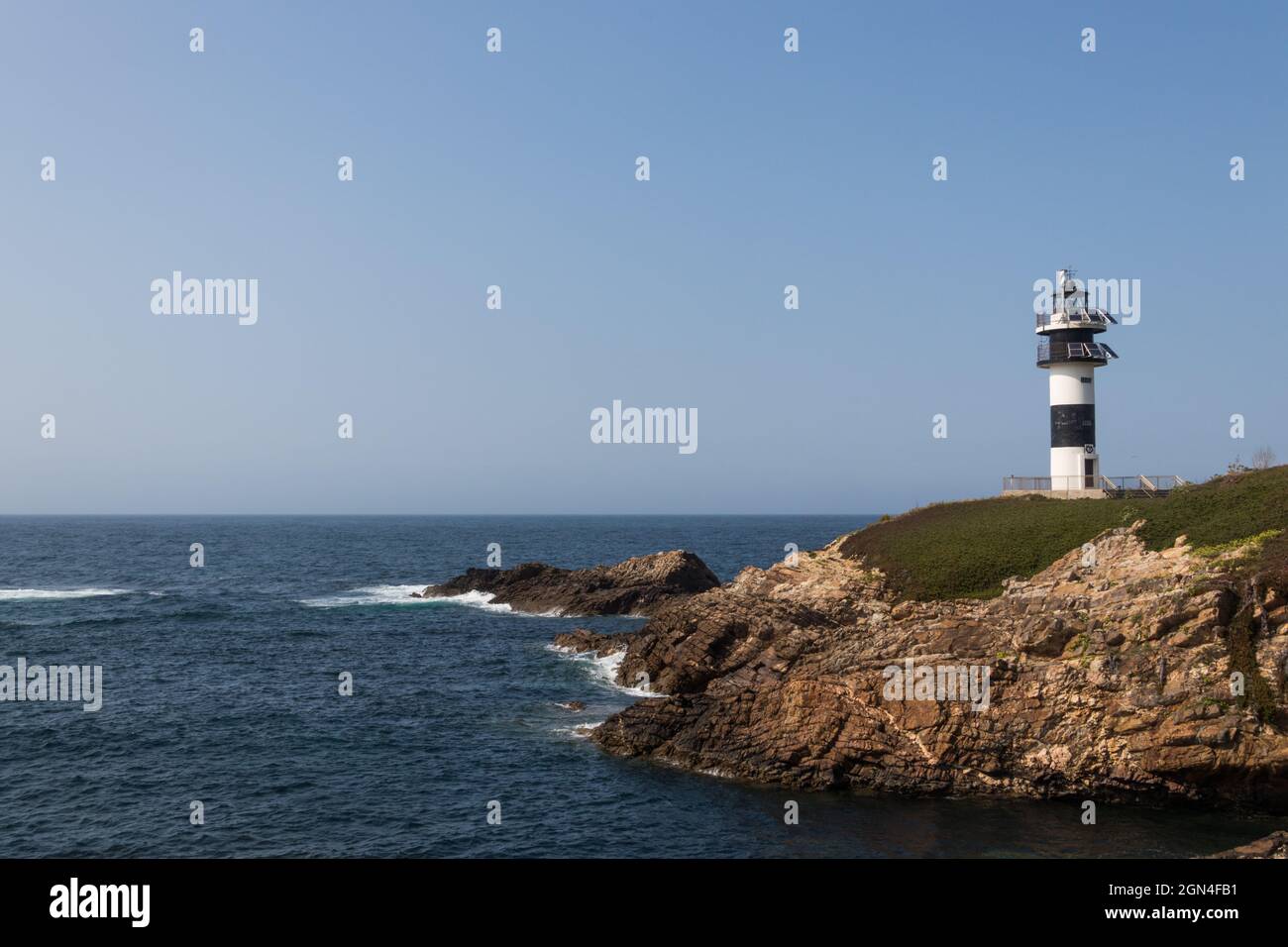 Beautiful view of the Pancha Lighthouse in Isla Pancha under a clear ...