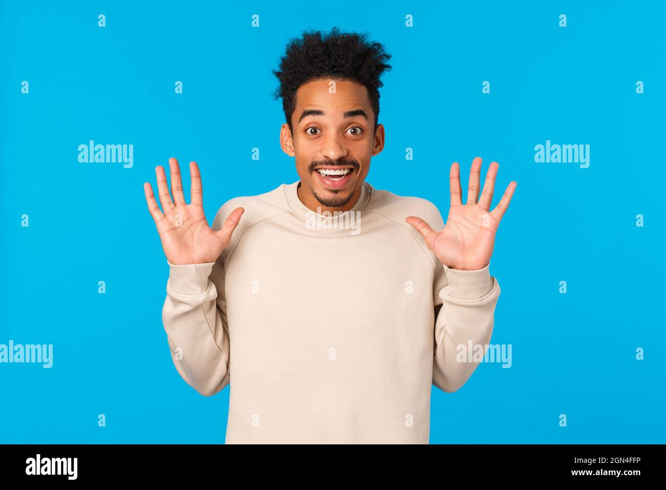 Hey no hands, I got nothing. Cheerful smiling handsome african american ...