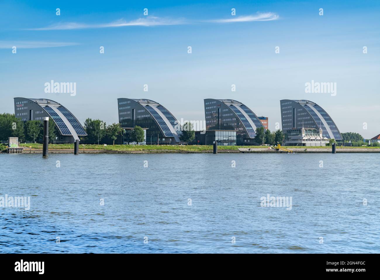 Four uniquely shaped commercial office building along New Meuse River ...