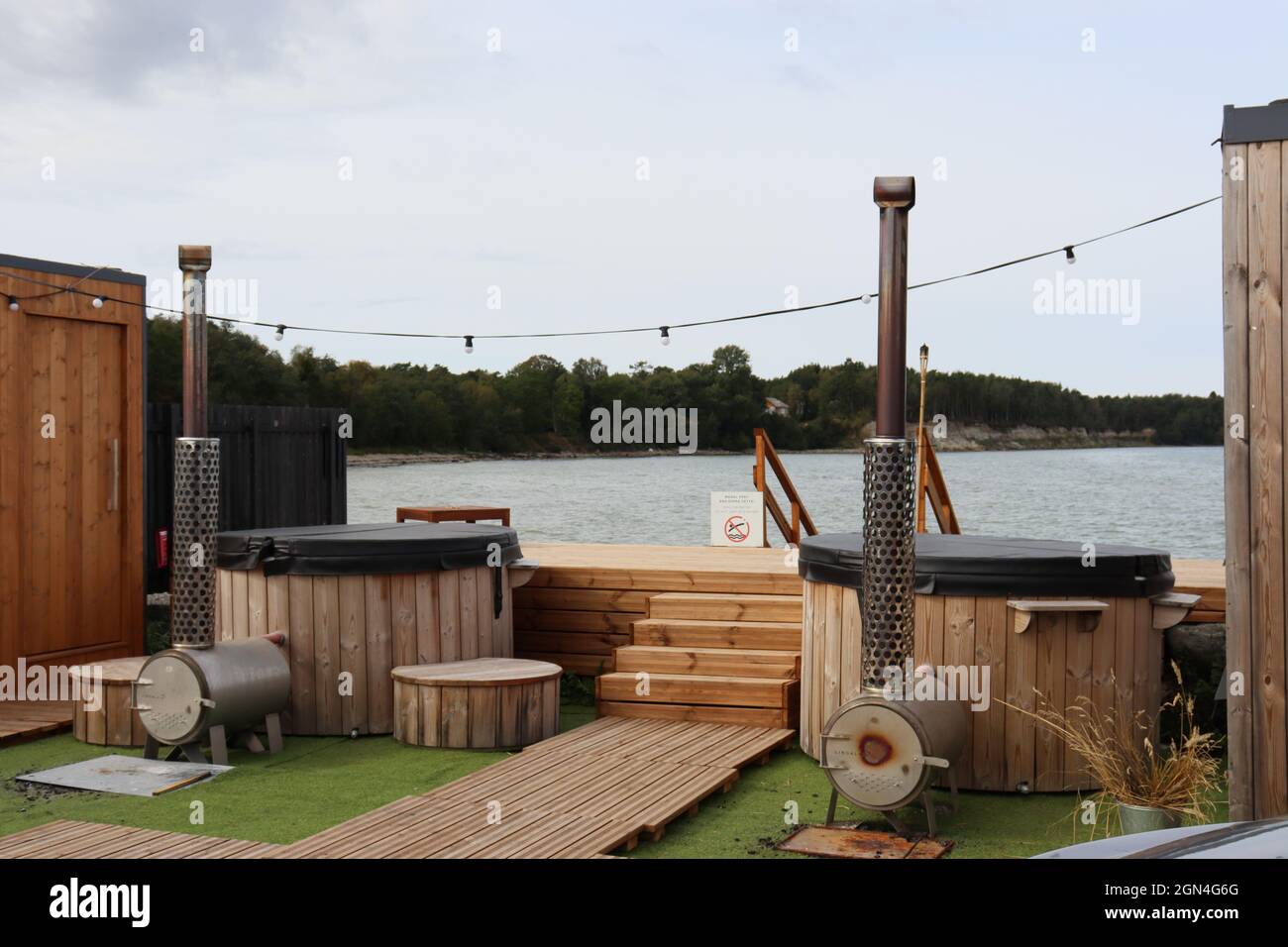 Bath barrel with a stove Stock Photo - Alamy