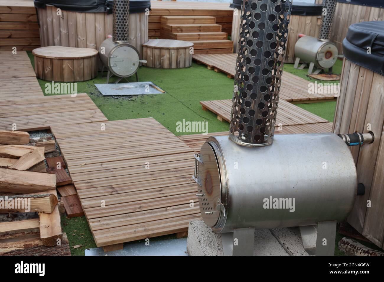Bath barrel with a stove Stock Photo - Alamy