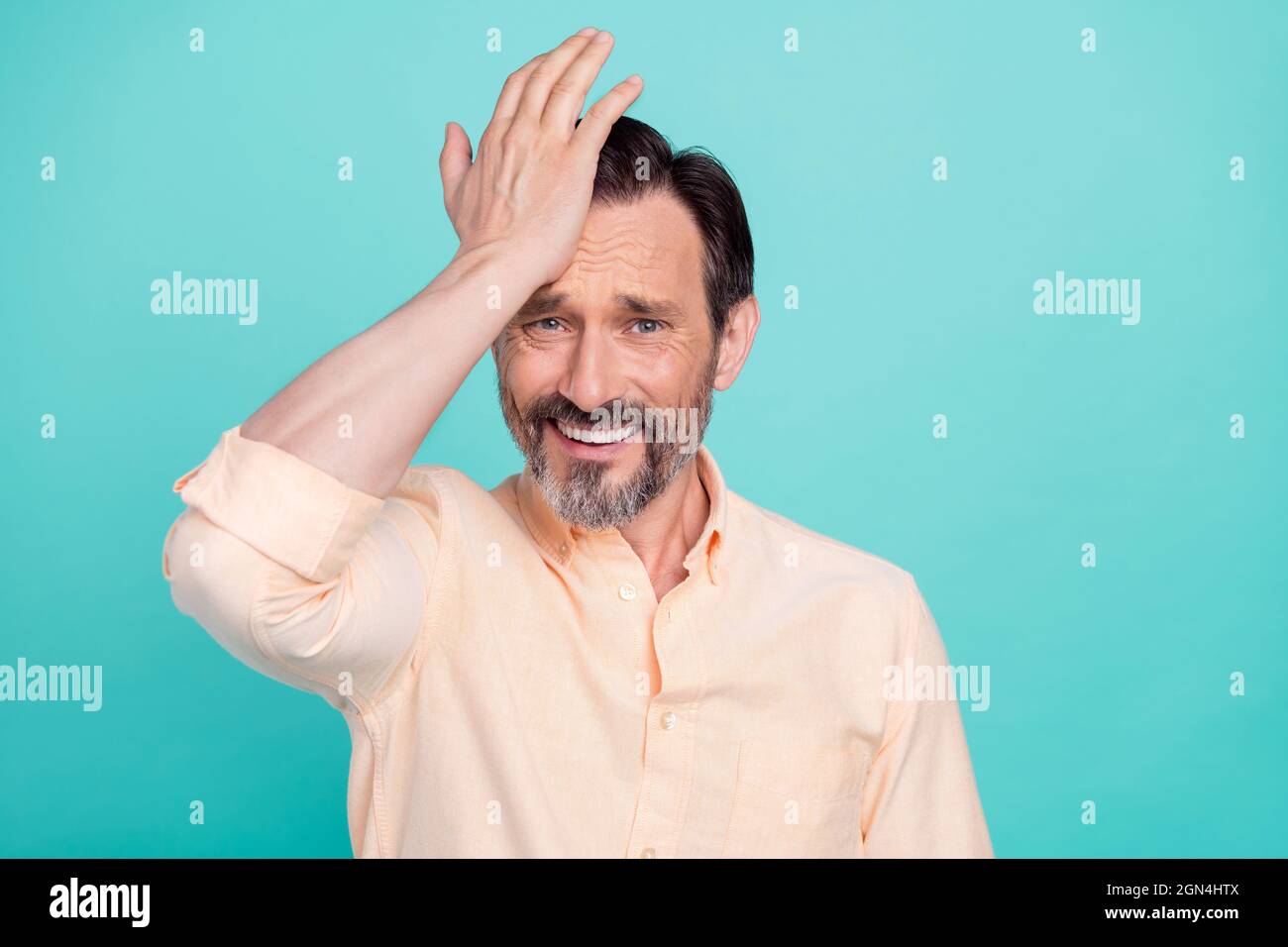 Photo of funky funny displeased male touch forehead oops sorry guilty ...