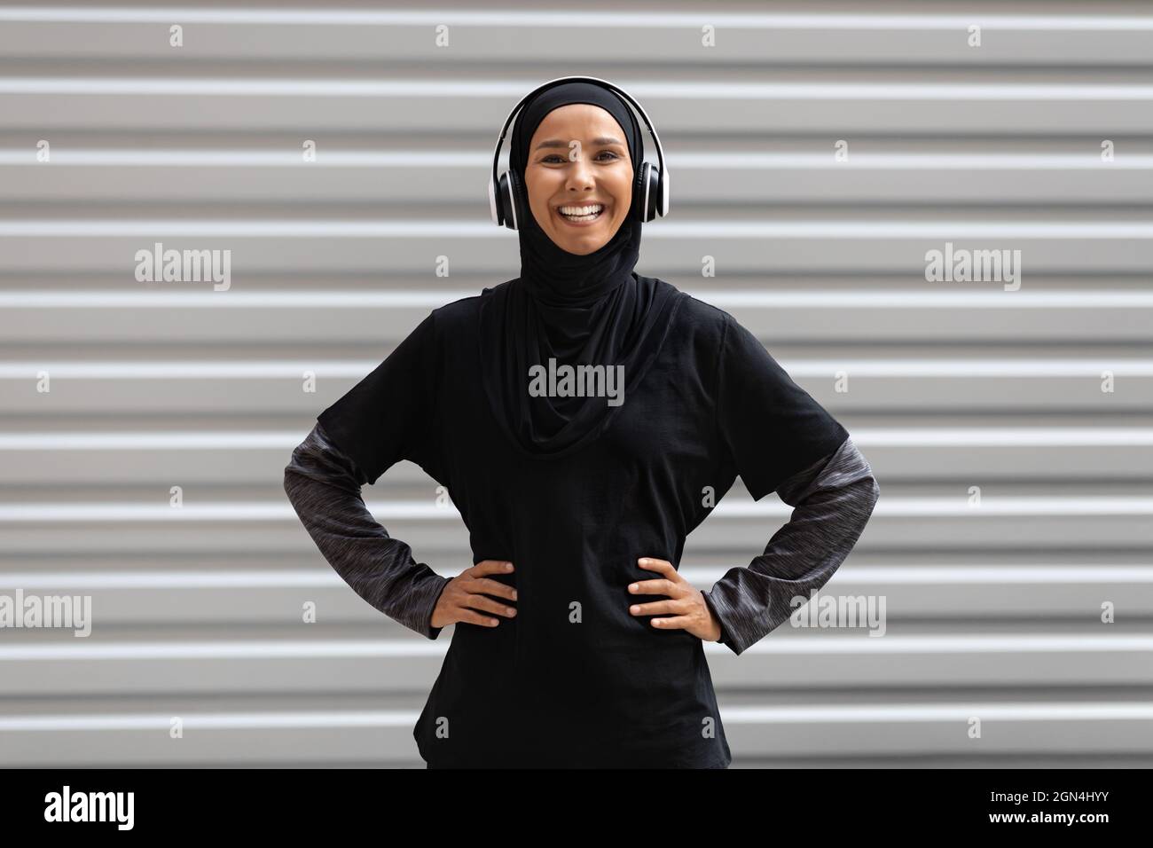 Outdoor Training. Portrait Of Sporty Muslim Woman In Hijab And Wireless ...