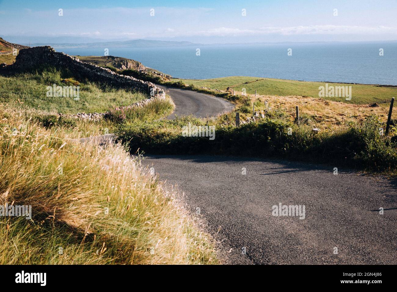 Winding coastal country road, Donegal Stock Photo - Alamy