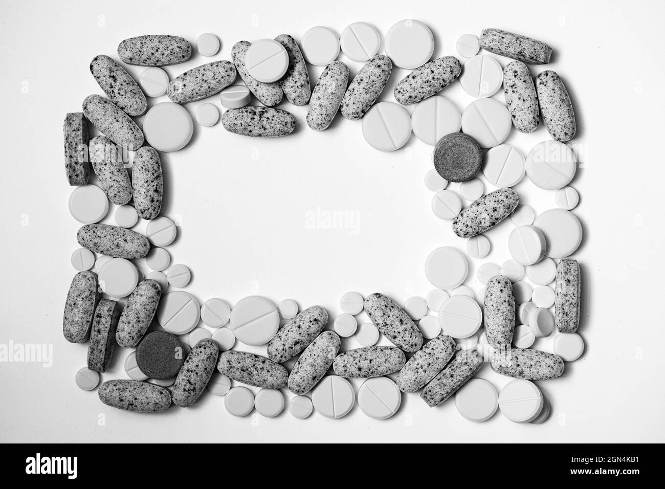 frame from assorted pills, textured background Stock Photo - Alamy