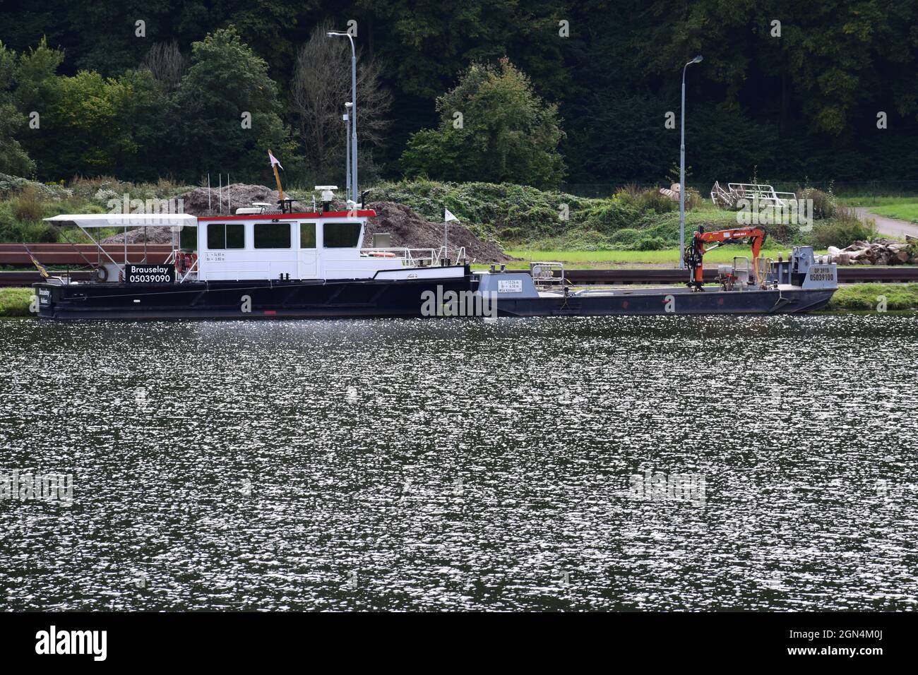 unusual service ship entering river lock Müden Stock Photo - Alamy