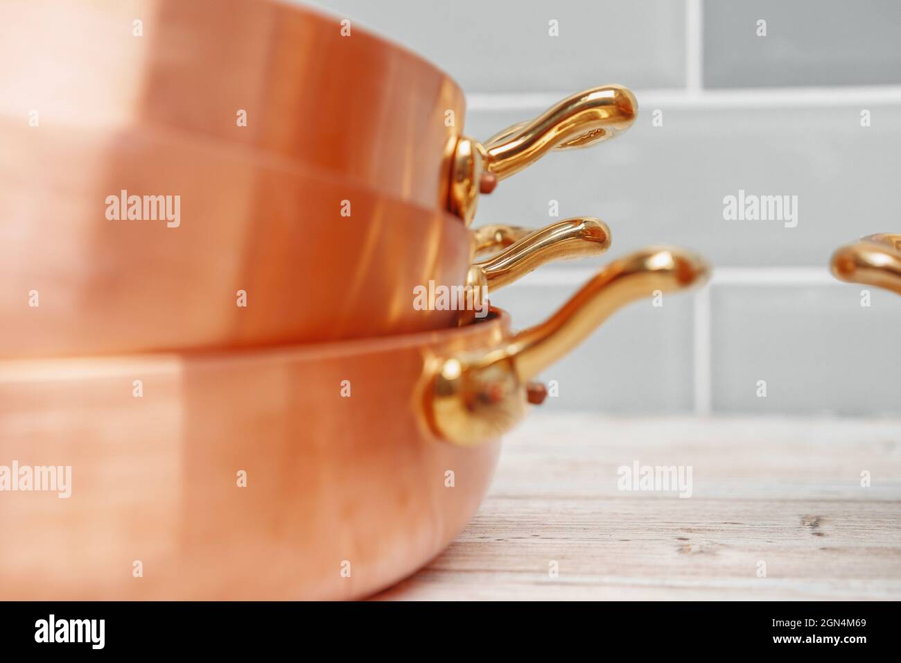 Modern kitchen details with copper kitchenware close up Stock Photo - Alamy