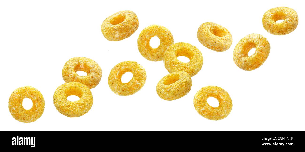 Falling corn rings isolated on white background Stock Photo - Alamy