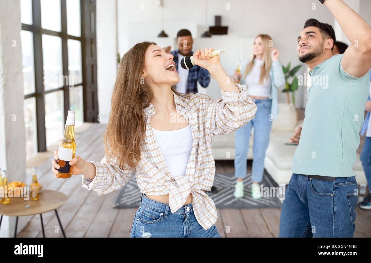 Female friends dancing singing drinking hi-res stock photography and ...