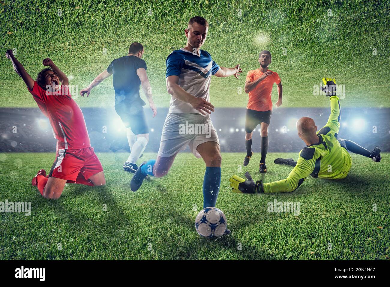 Football scene with competing football players at the stadium Stock ...