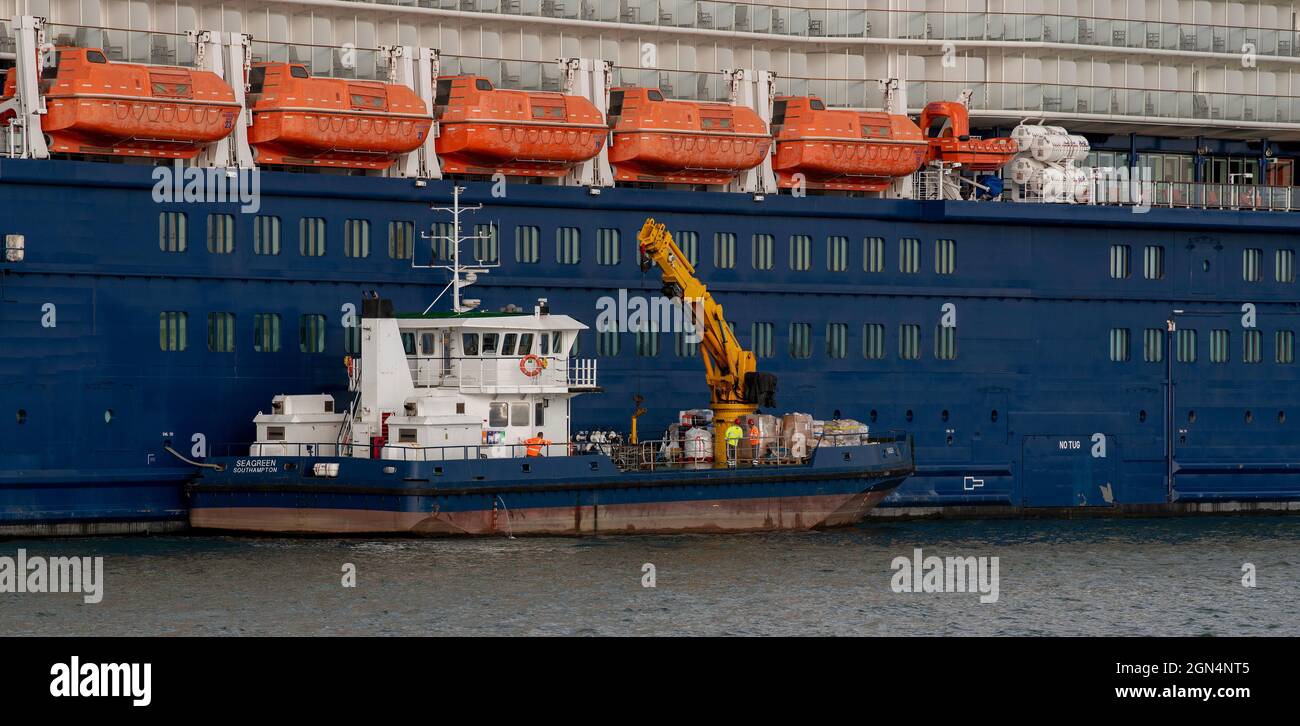 Southampton, England, UK. 2021. A port tender collecting waste and ...