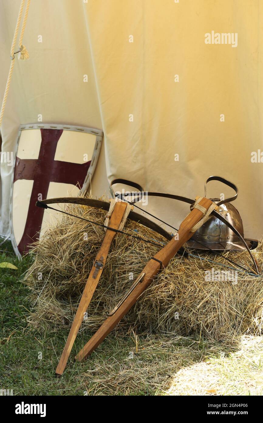 Vertical closeup of the medieval crossbows with a shield Stock Photo ...