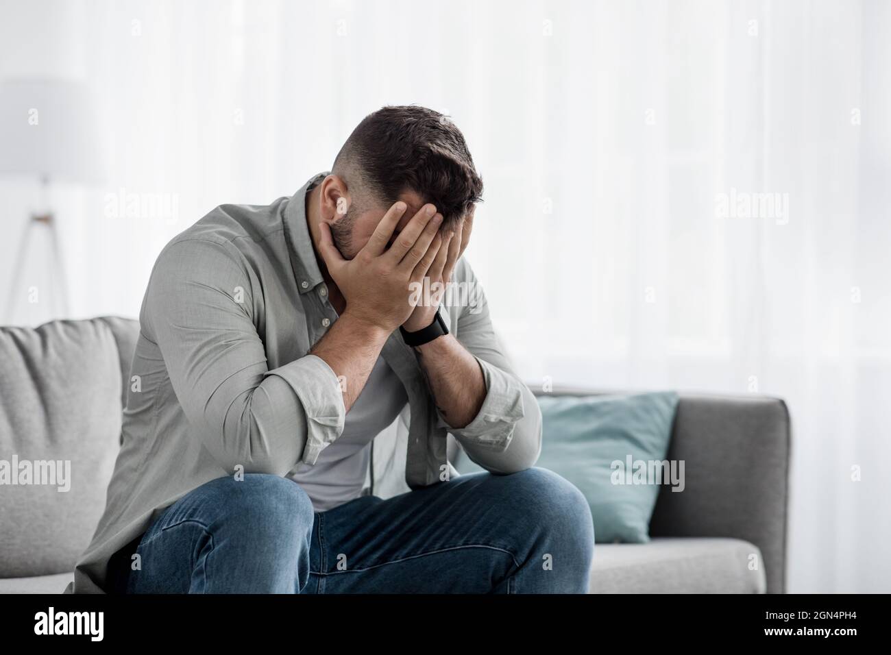 Shame despair, portrait of sad man suffers from headache, stress ...