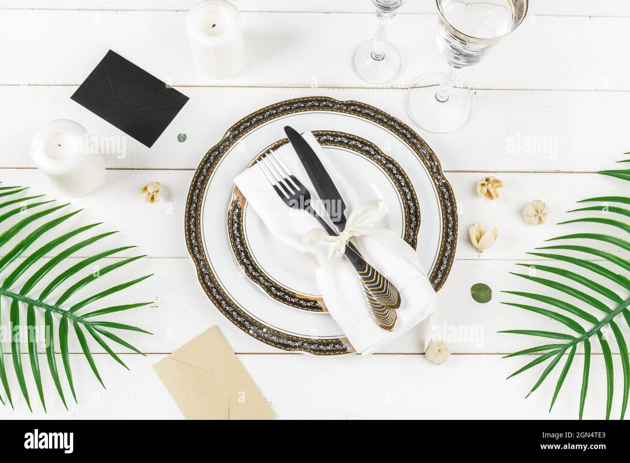 Table with plates and cutlery, view from above Stock Photo - Alamy