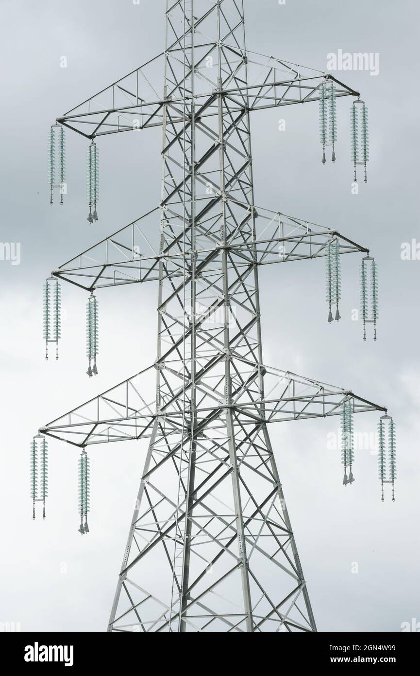 High voltage post. High-Voltage tower sky background . transmission ...