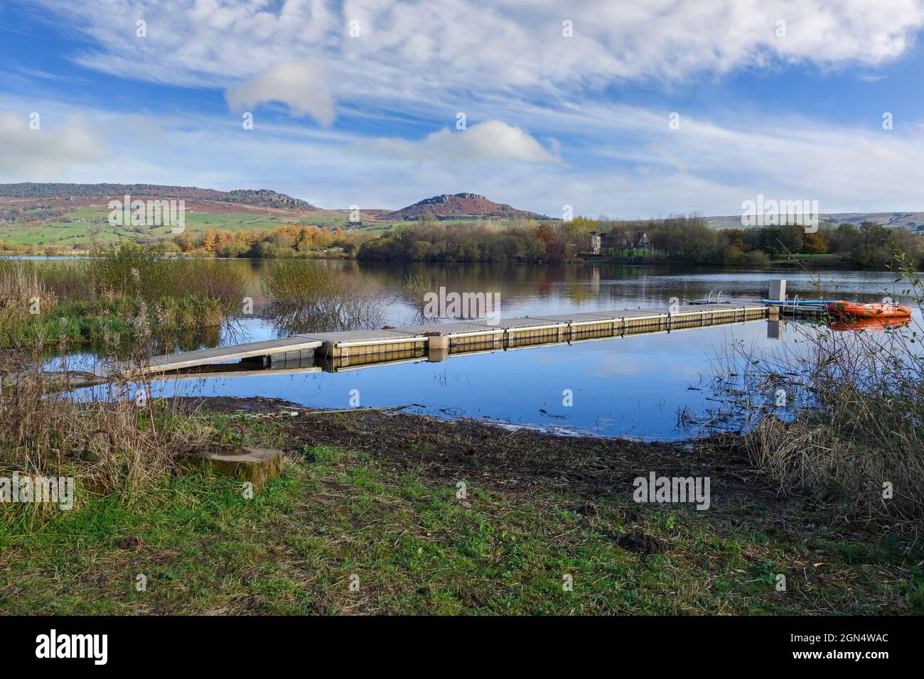 A pontoon walkway with Hen Cloud on The Roaches in the background ...