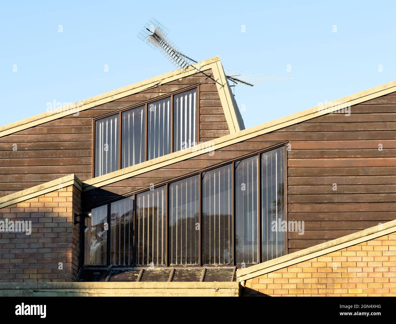 House with asymmetrical saltbox skillion roof. Suburban house Stock ...