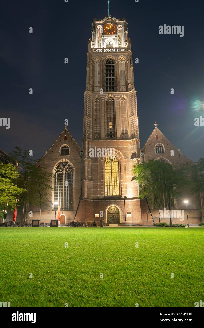 Magnificent entrance and clock tower on St. Lawrence Church illuminated ...