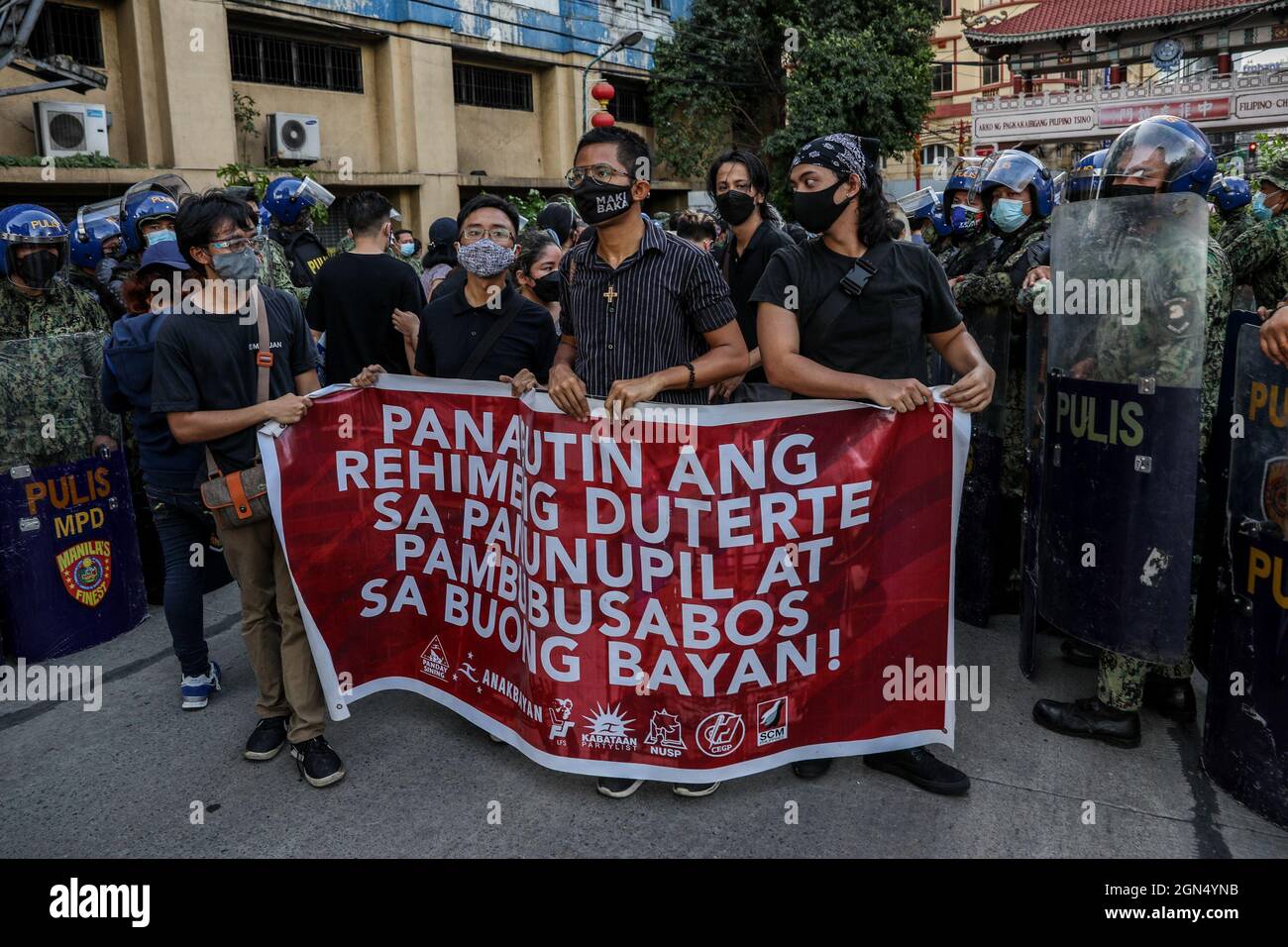 Manila, Philippines. September 21st 2021. Filipino activists hold signs ...