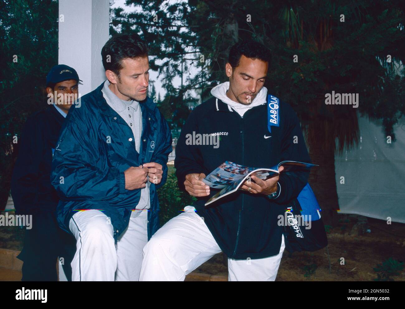 Moroccan tennis player Karim Alami and trainer Ribeyre Francois, 1990s ...