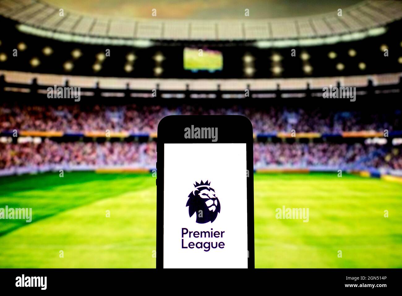 In this photo illustration a Premier League logo seen displayed on a ...